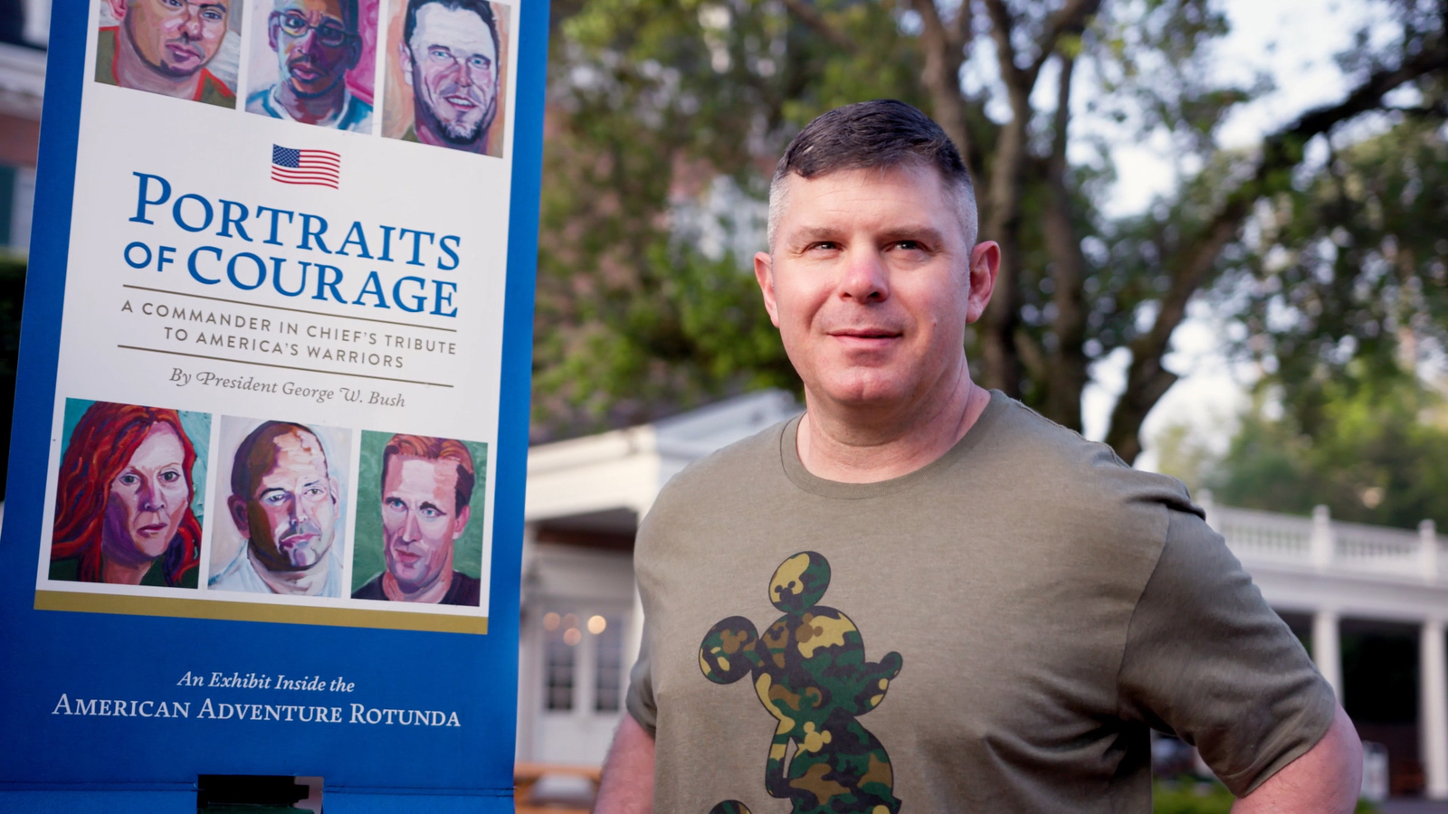 Sergeant First Class Matthew Ayers visits his portrait at Walt Disney ...