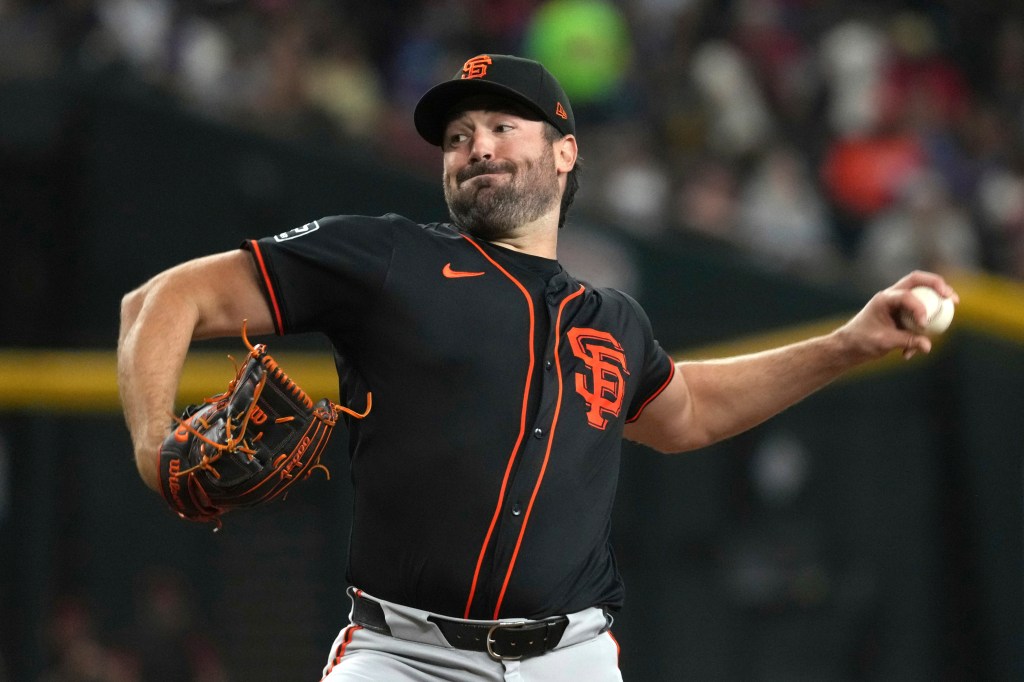 Ray throws second career complete game as SF Giants split series ...